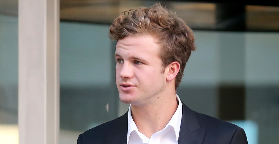 Fence jumper who kicked festival staff in the head found not guilty