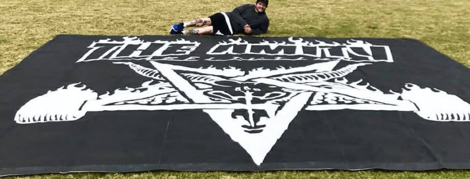 This guy is selling a massive Amity Affliction stage banner