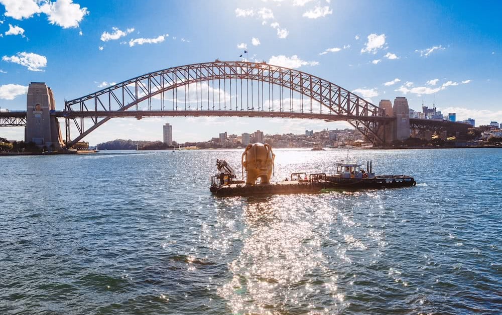 There's a giant Travis Scott head on a barge floating around Sydney ...