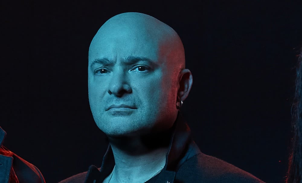 The singer of Disturbed has removed his signature chin piercing