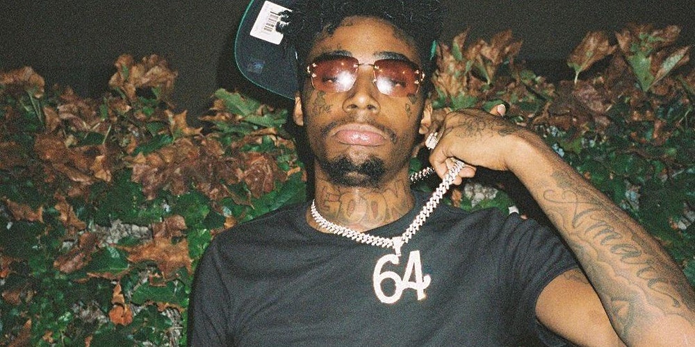 Goonew's body embalmed and propped up on stage at club for his funeral